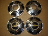 Dog dish hubcaps from a 3/4 ton Chevy K20 | Pirate 4x4